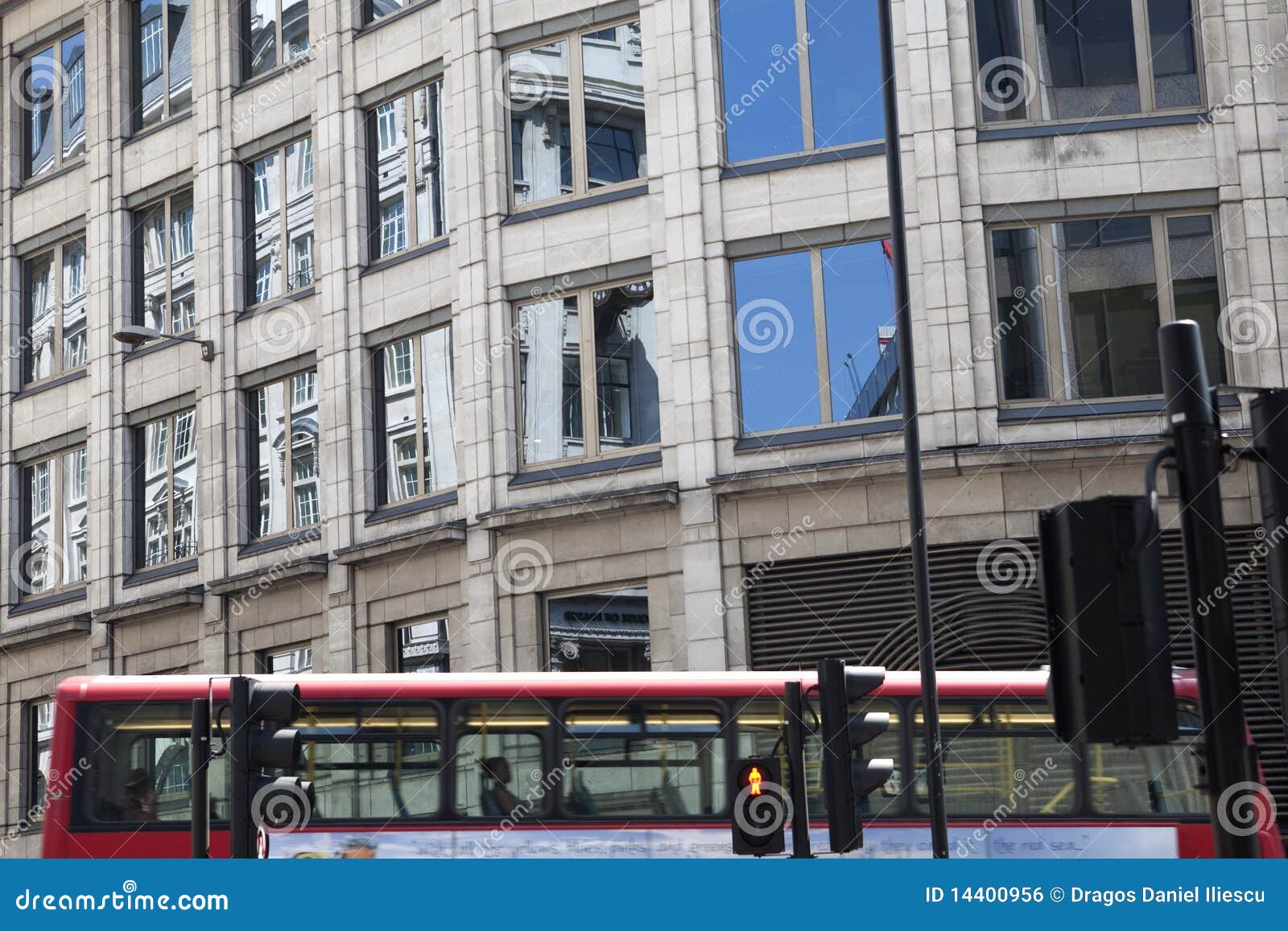 Red Bus And Windows From Offices In UK Stock Photography ...