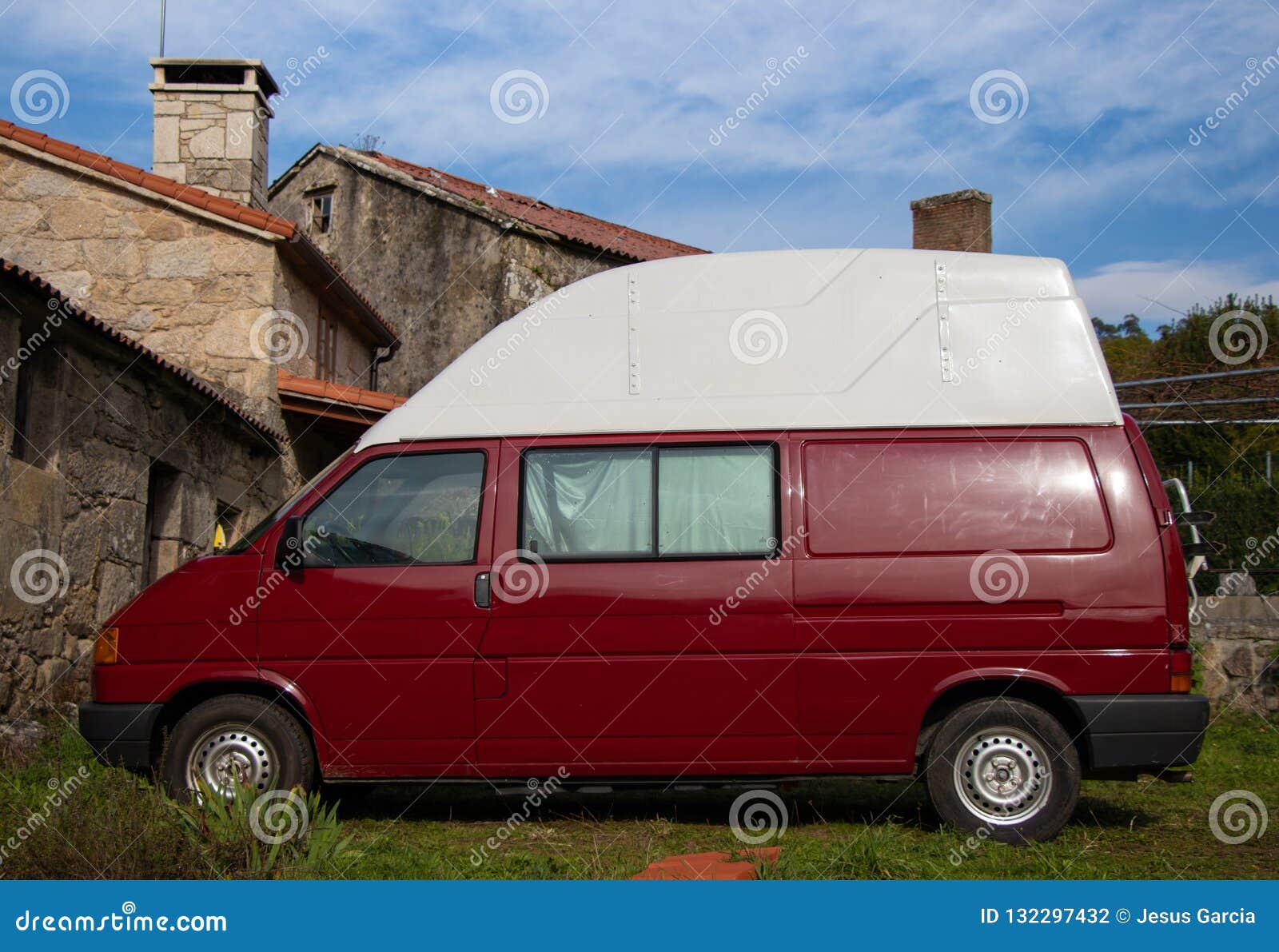 Red Camper Van Parked on the Grass in a Rural Setting Stock Photo ...