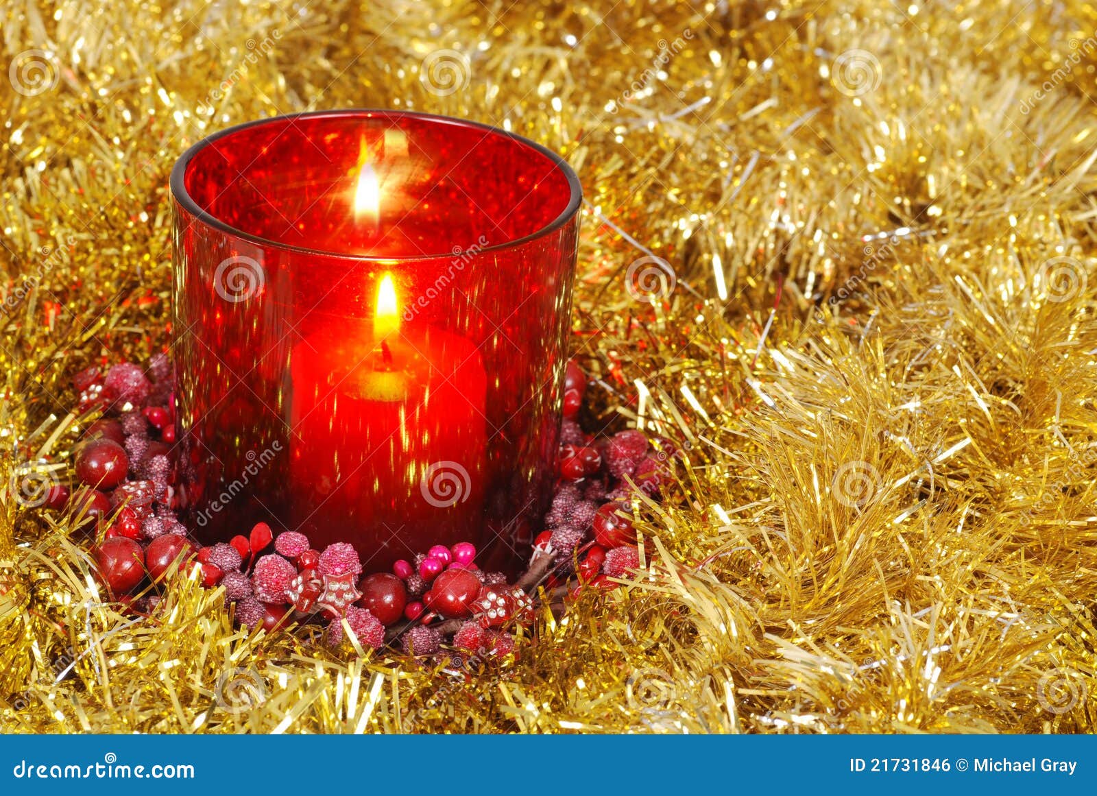 Red candle in gold garland stock photo. Image of bright - 21731846