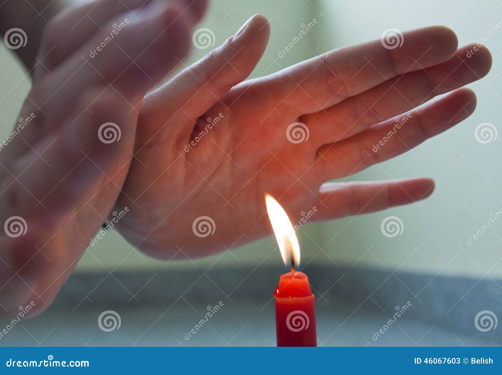 Red candle and human hands stock image. Image of christmas - 46067603