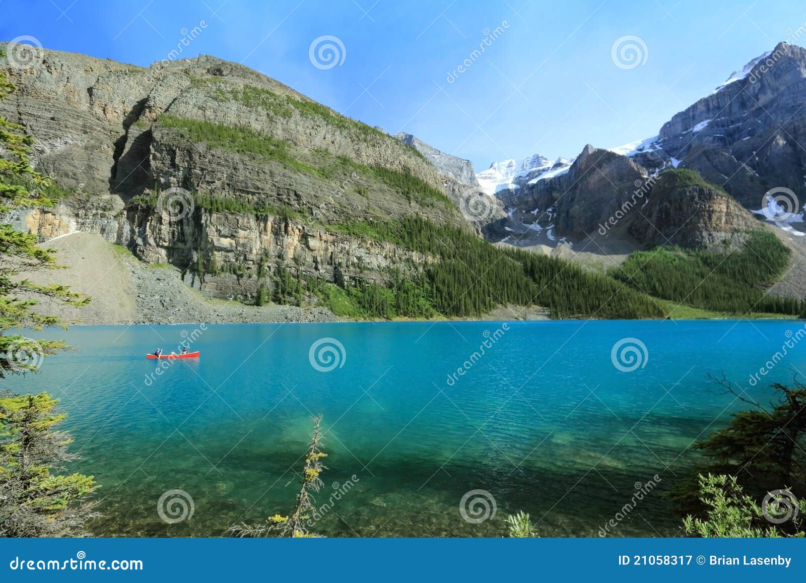 Red Canoe on Turquoise Lake - Banff, Canada Stock Image - Image of ...