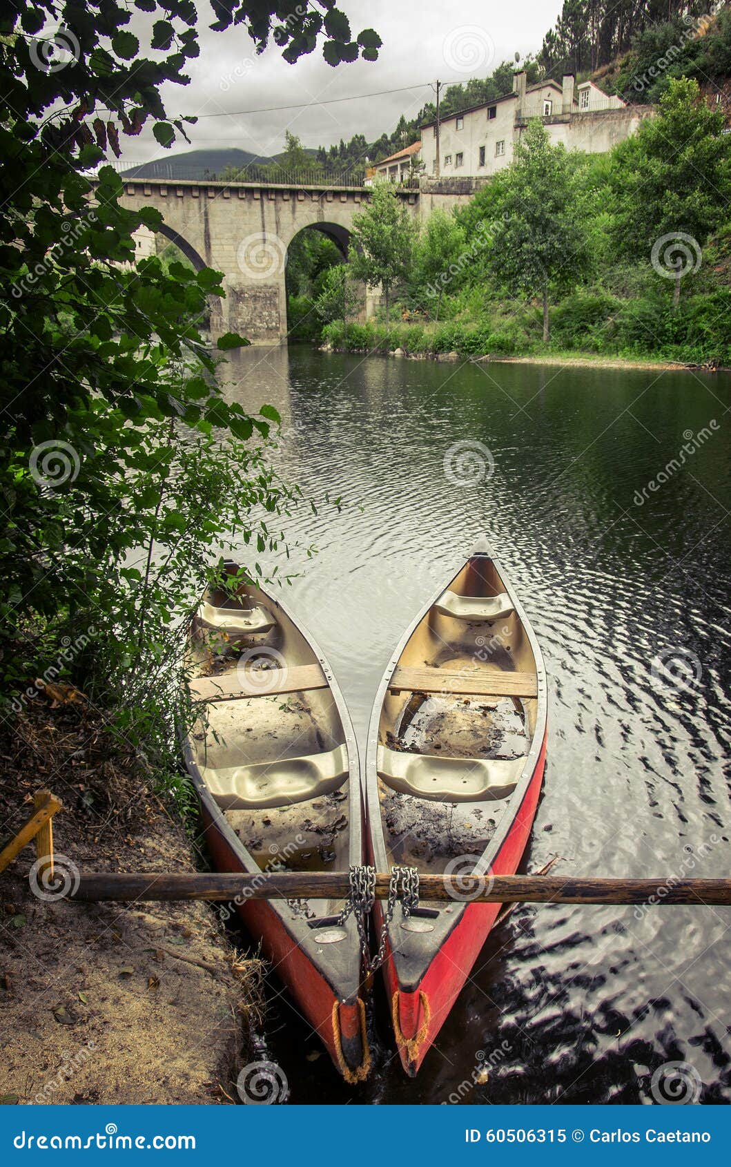 Red Canoes stock image. Image of cloudy, nature, bridge - 60506315