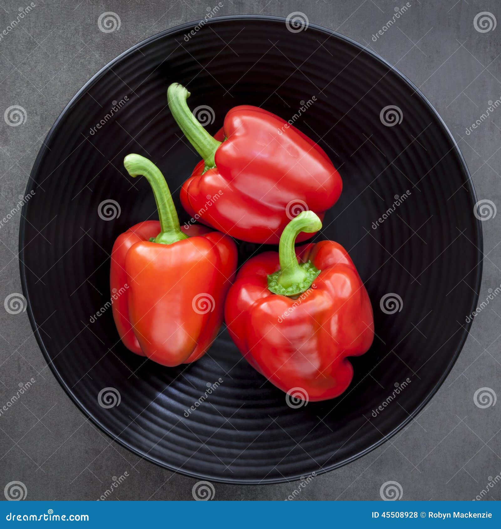Red Capsicum on Black Plate. Stock Photo - Image of bellpepper, platter ...