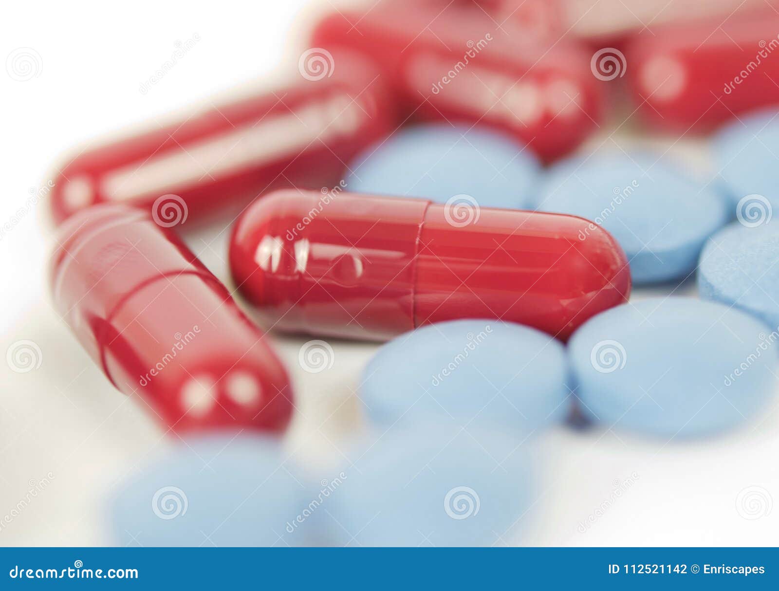 Red Capsules and Blue Tablets Isolated Stock Photo - Image of hospital ...