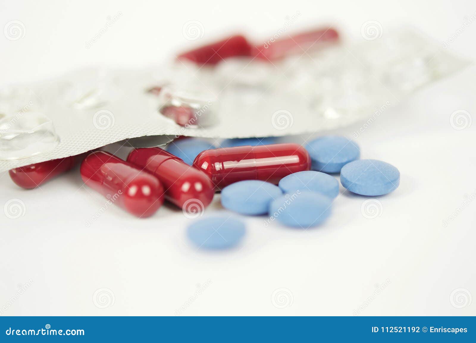 Red Capsules and Blue Tablets Isolated Stock Photo - Image of hospital ...