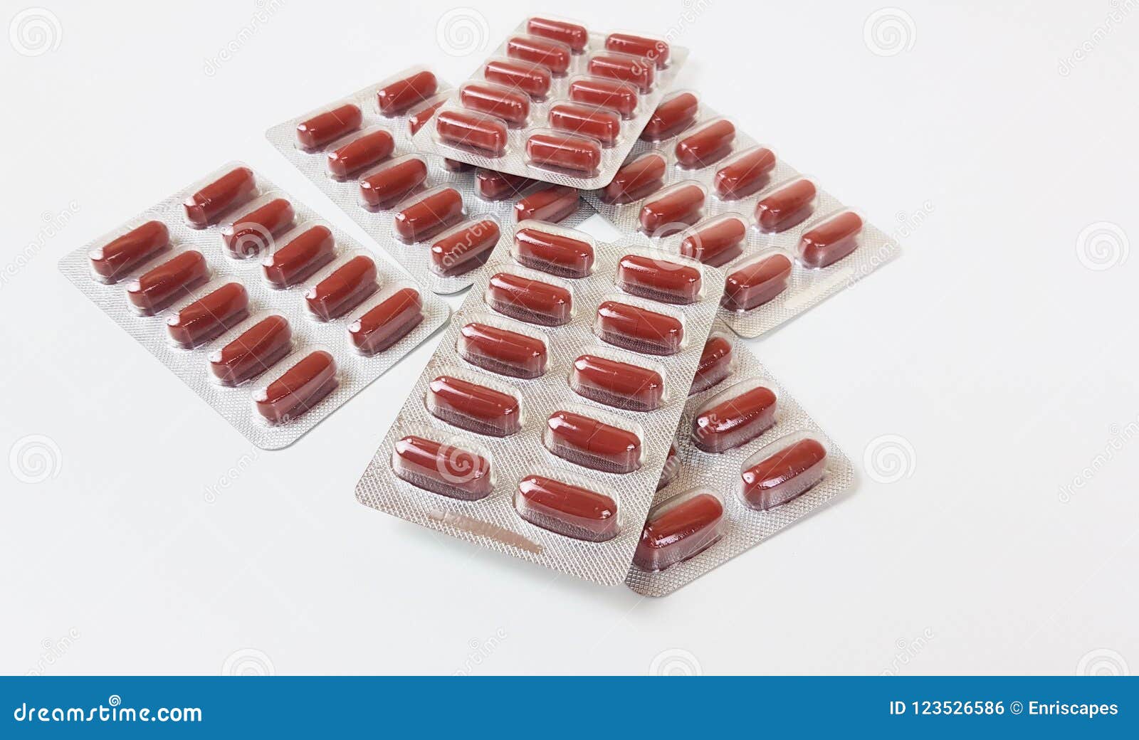 Red capsules isolated stock photo. Image of tablet, white - 123526586