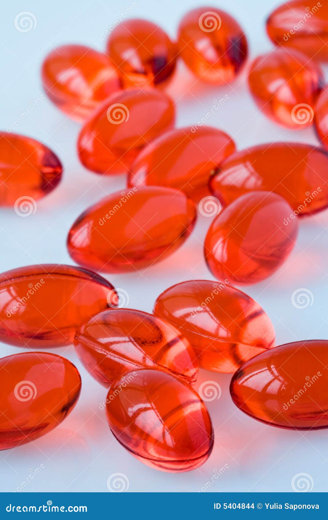 Red Capsules on a White Surface Stock Photo - Image of healthcare ...