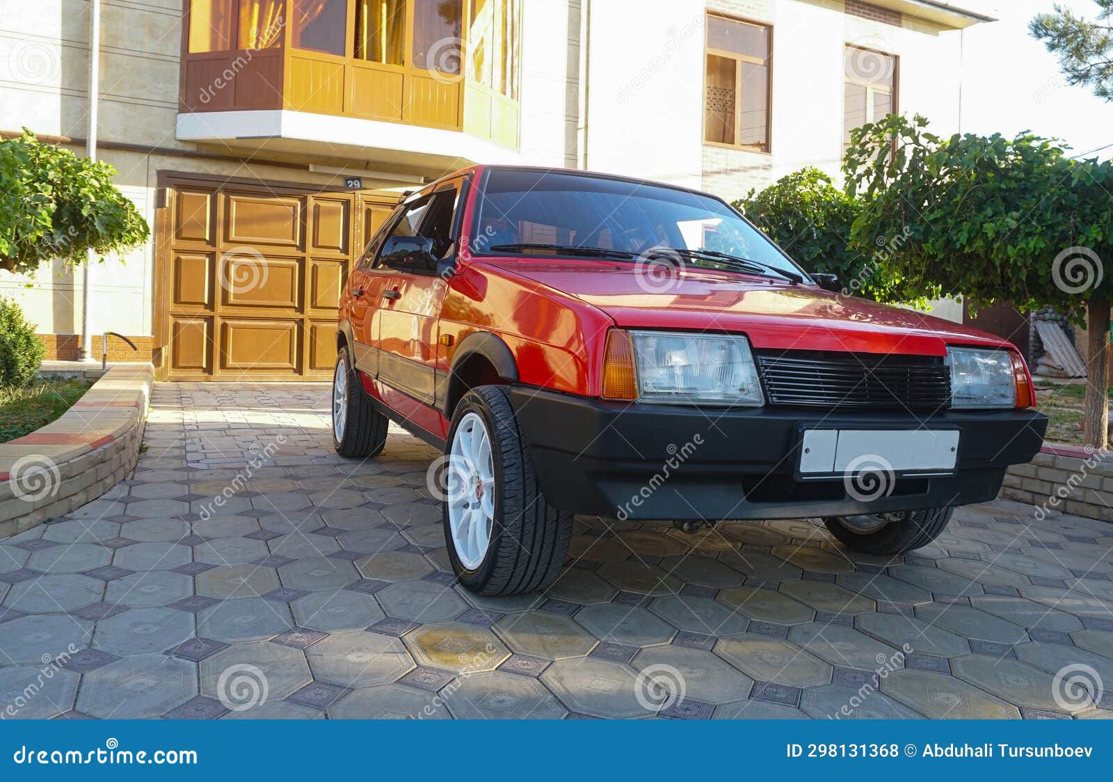 A Red Car in Front of the House Stock Photo - Image of transport, urban ...