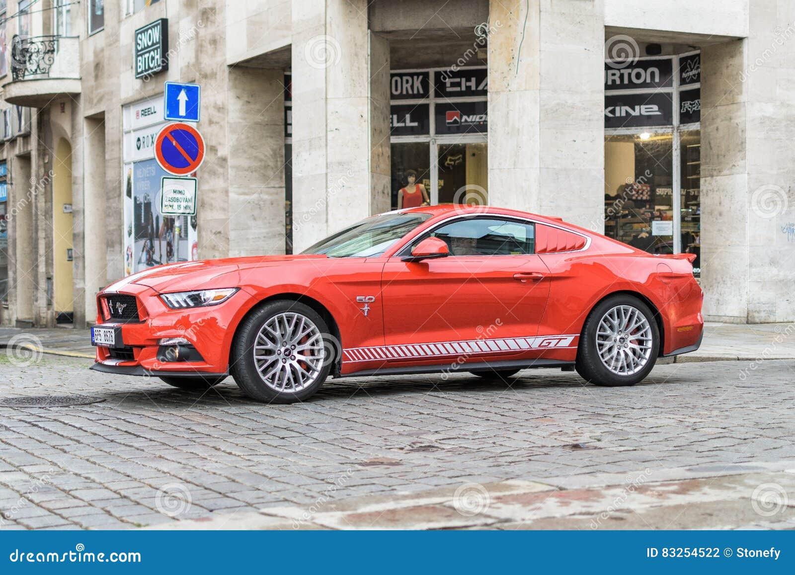 A Red Car Halted at the Turning of a Street Editorial Photography ...