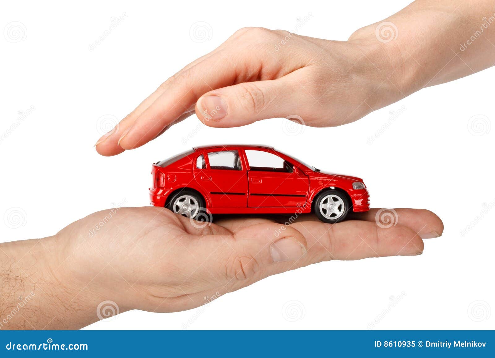 Red car in hands stock image. Image of preservation, safe - 8610935