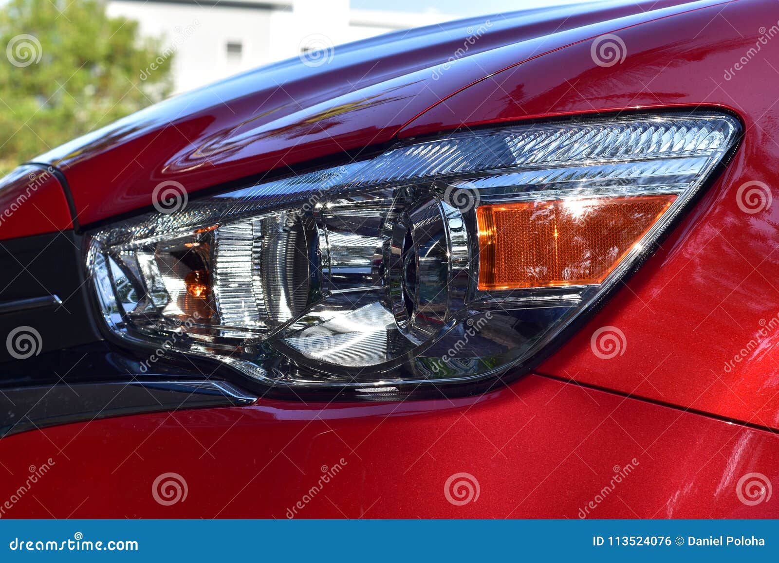 Red car headlight detail stock photo. Image of light - 113524076