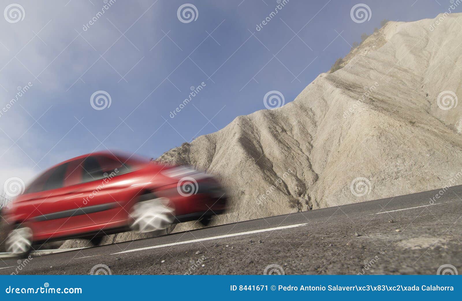 Red Car in Moving in a Arid Landscape Stock Image - Image of ...