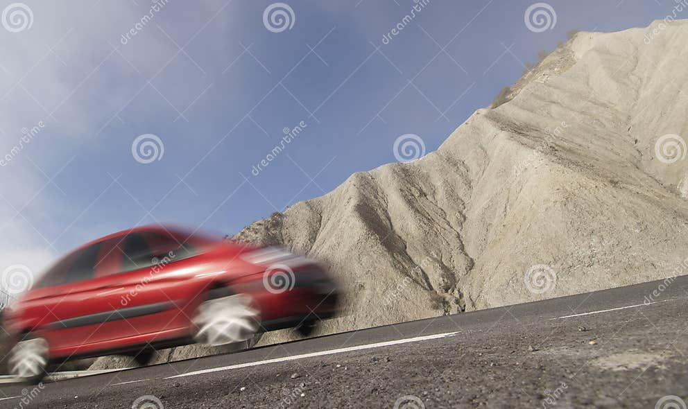 Red Car in Moving in a Arid Landscape Stock Image - Image of ...
