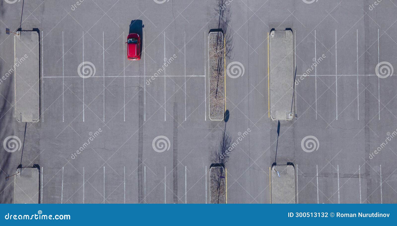 A Red Car is Parked in an Empty Parking Lot Stock Photo - Image of ...