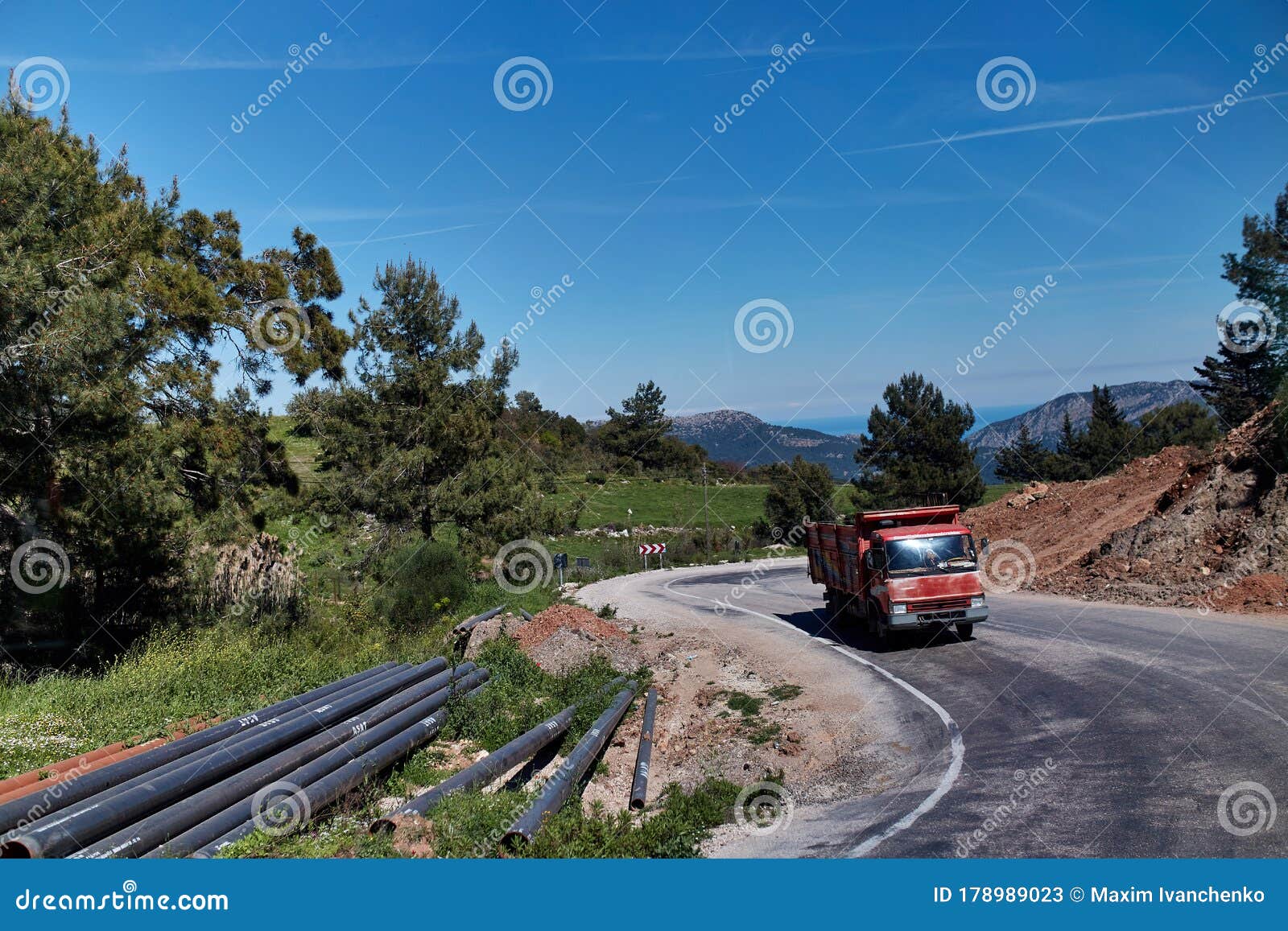 Red car on the road stock image. Image of freeway, forest - 178989023