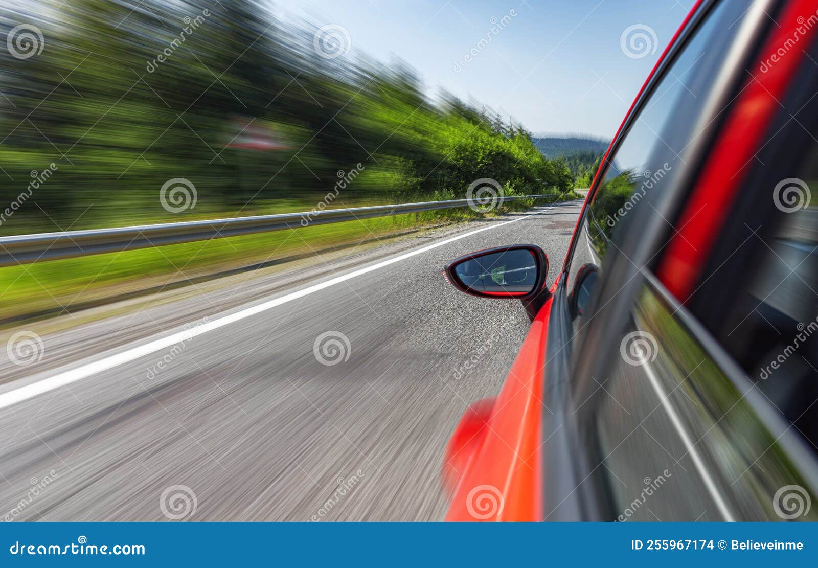 Red car on the road. stock photo. Image of style, shiny - 255967174