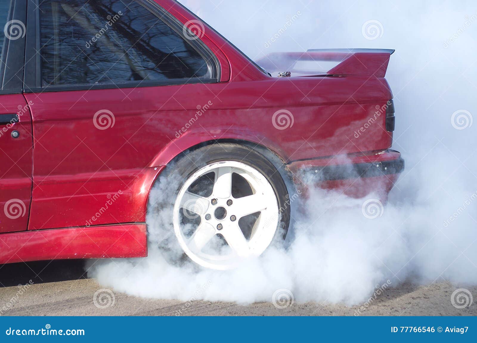 Red car with smoke stock photo. Image of wheel, white - 77766546