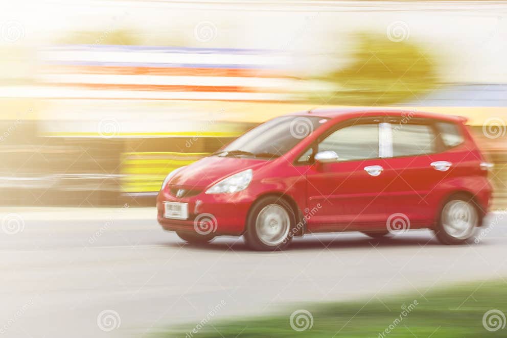 Red car Speeding in road stock image. Image of movement - 321203689