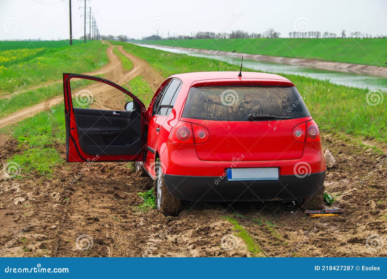 The Red Car Stuck in the Mud. Can Not Fall Out of the Mud Stock Image ...