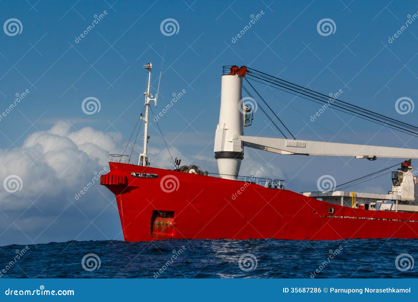 Red cargo ship in the sea stock photo. Image of business - 35687286