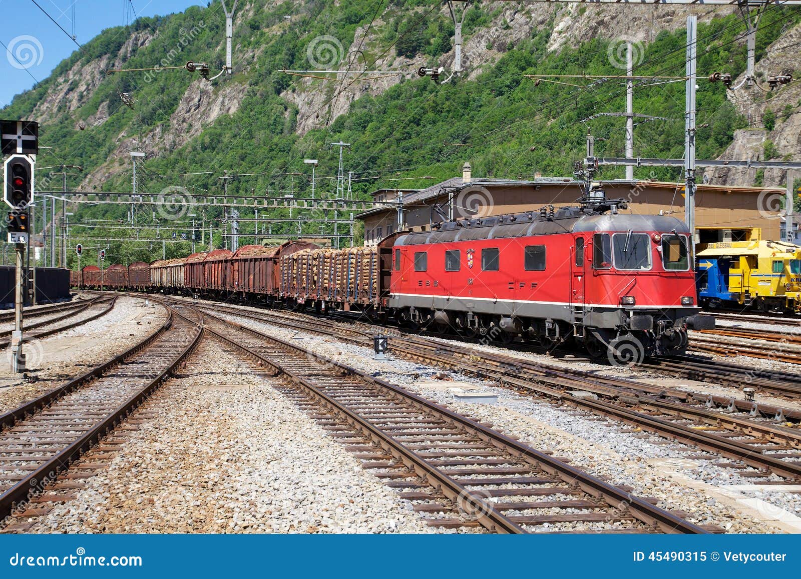 Red cargo train at station editorial image. Image of perspective - 45490315