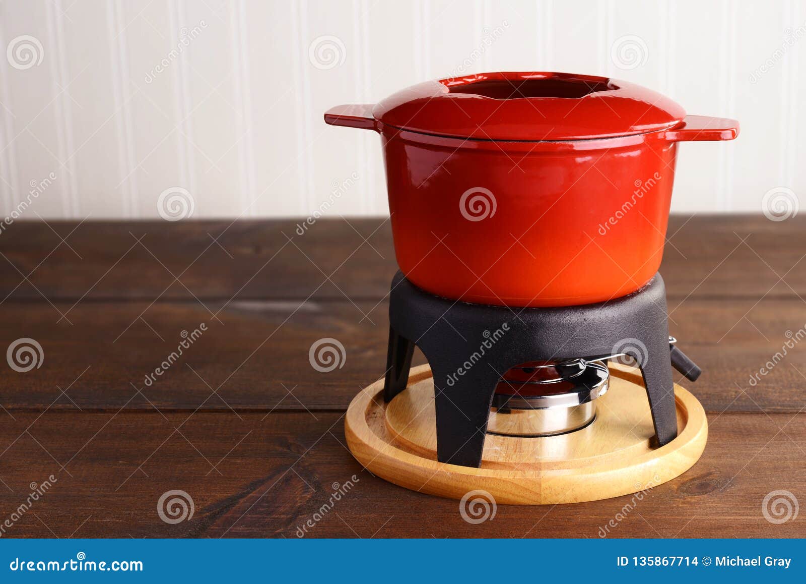 Red cast iron fondue pot stock photo. Image of metal - 135867714