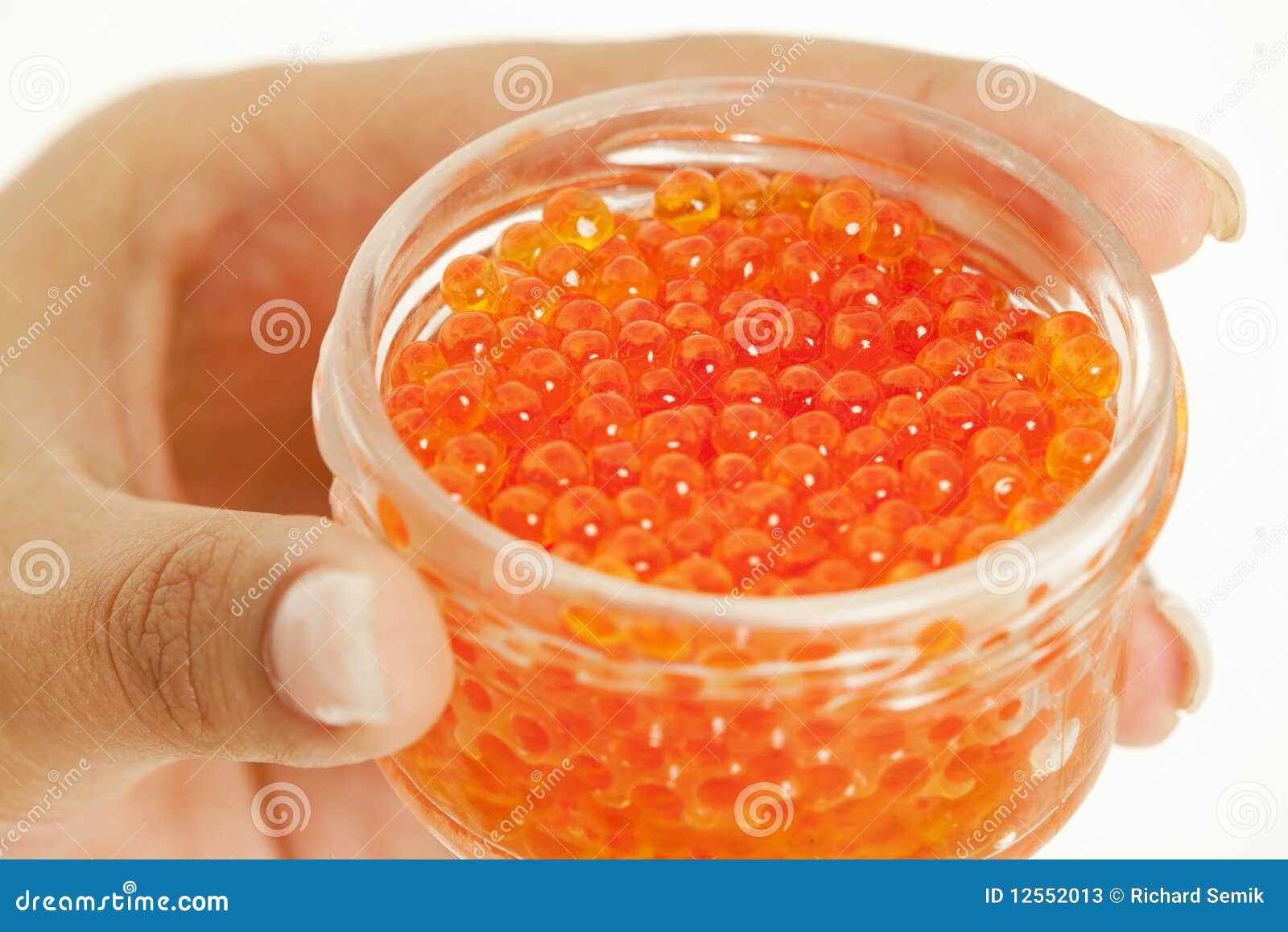 Red caviar stock image. Image of closeup, interiors, holding - 12552013