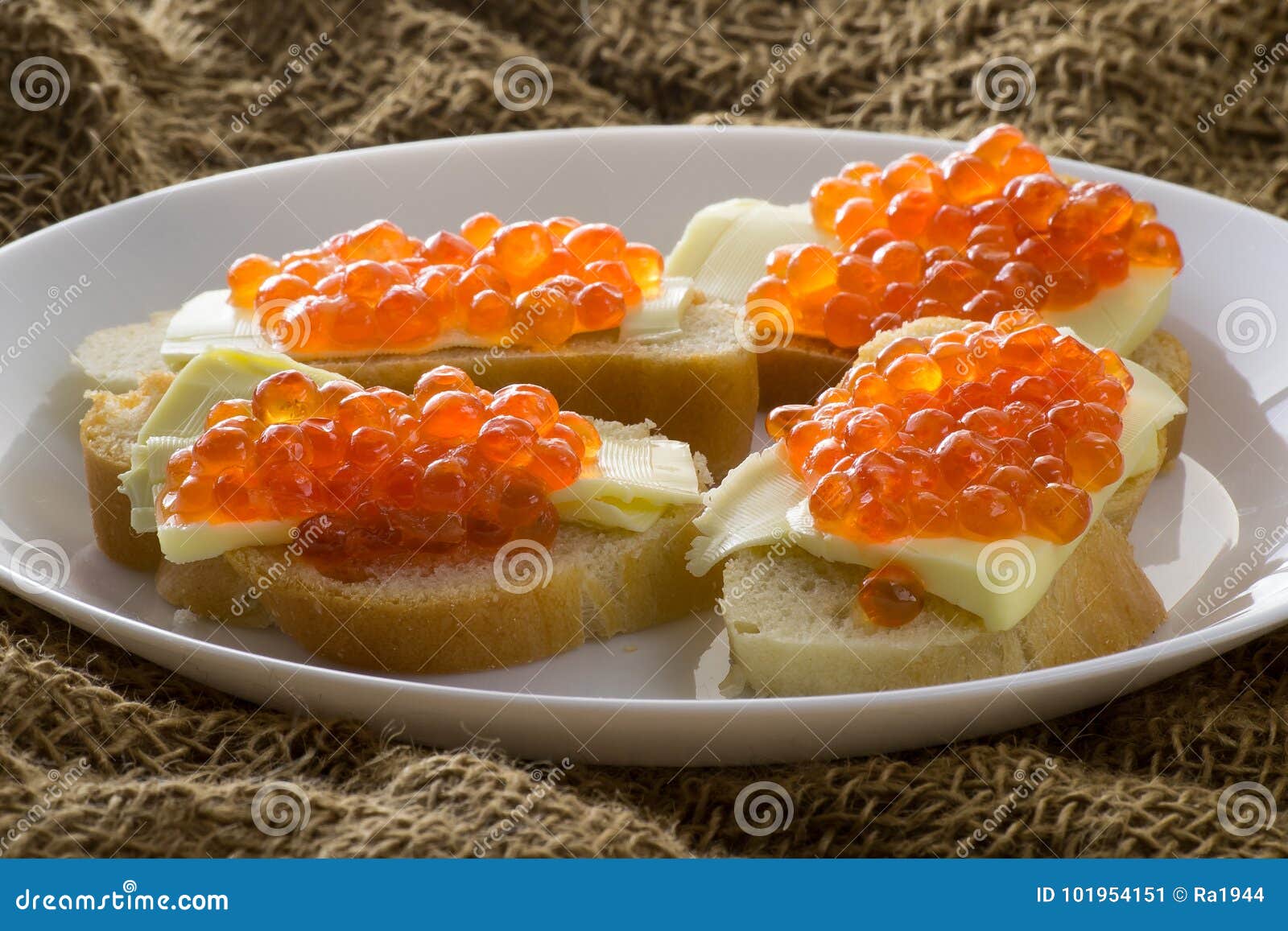 Red Caviar with Butter and Baked Bread. Close-up Stock Image - Image of ...