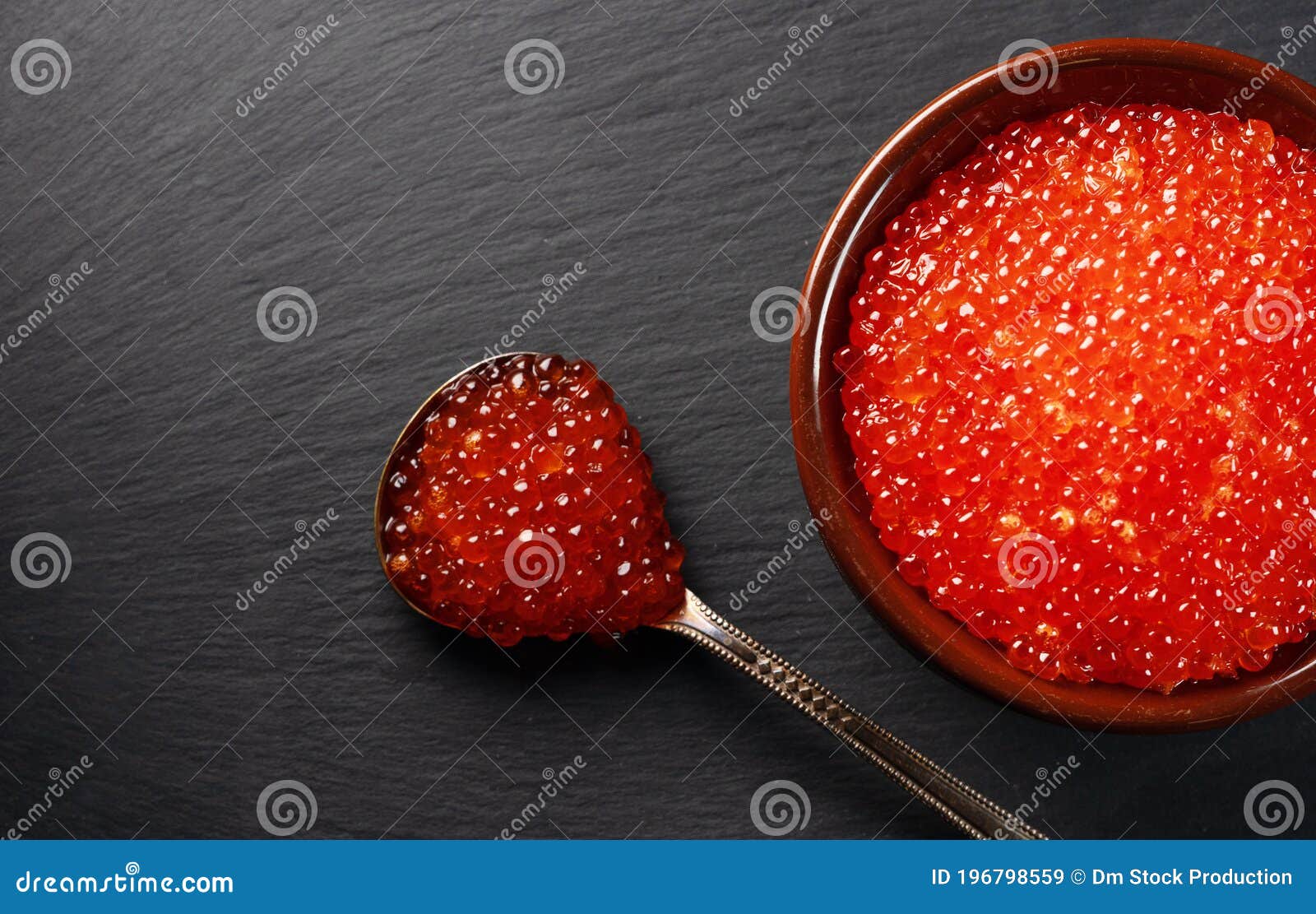 Red caviar in pot stock image. Image of delicious, omega - 196798559