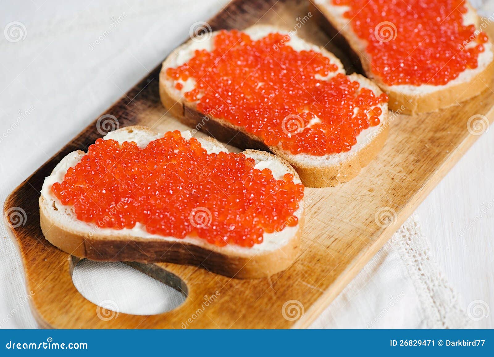Red Caviar on a Slice of Bread and Butter Stock Image - Image of ...