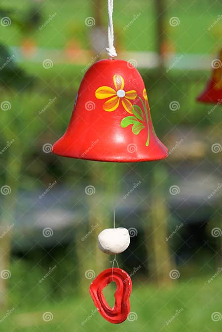 Red ceramic bells hanging stock image. Image of ground - 199418869