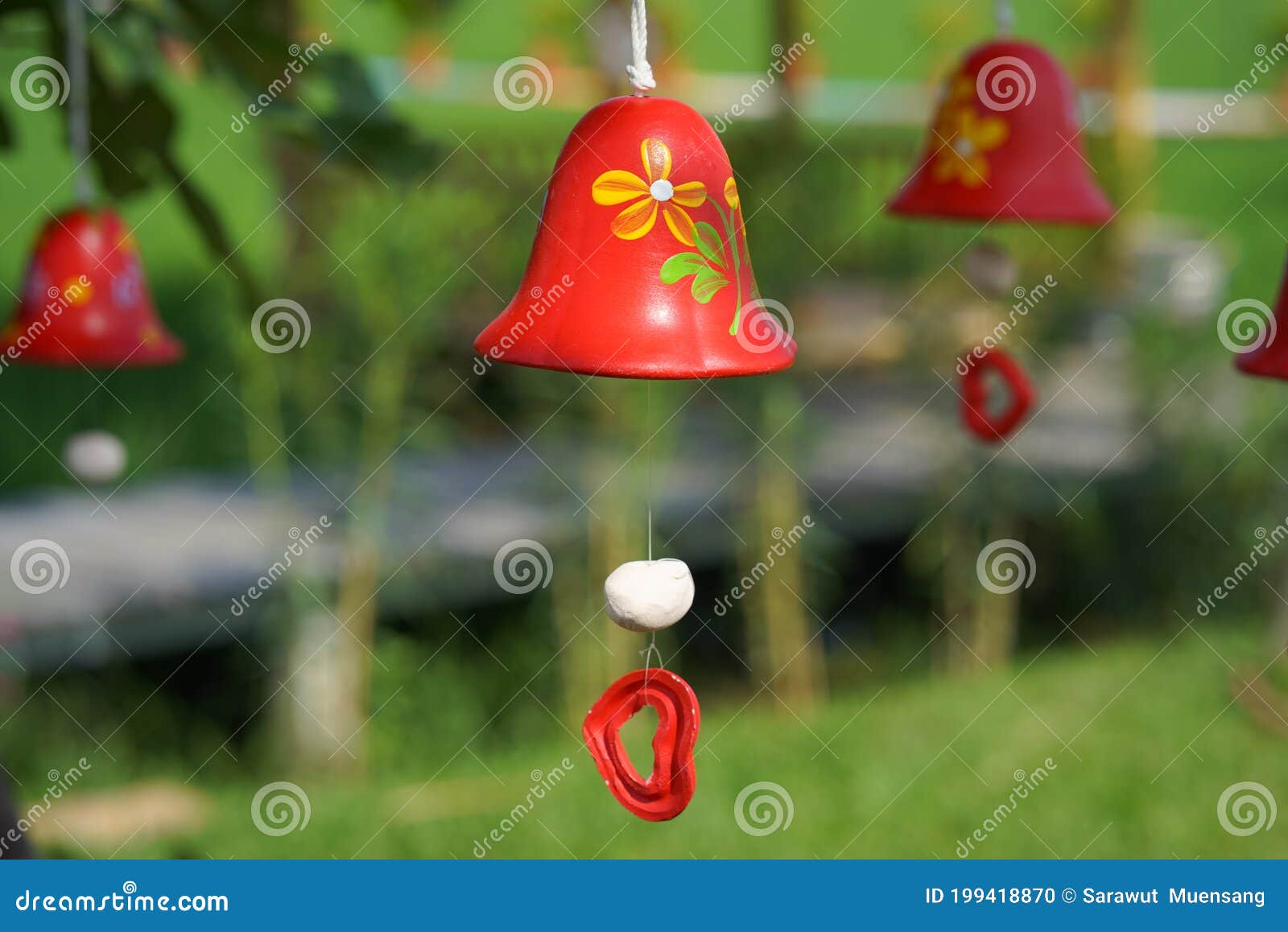 Red ceramic bells hanging stock photo. Image of elegant - 199418870