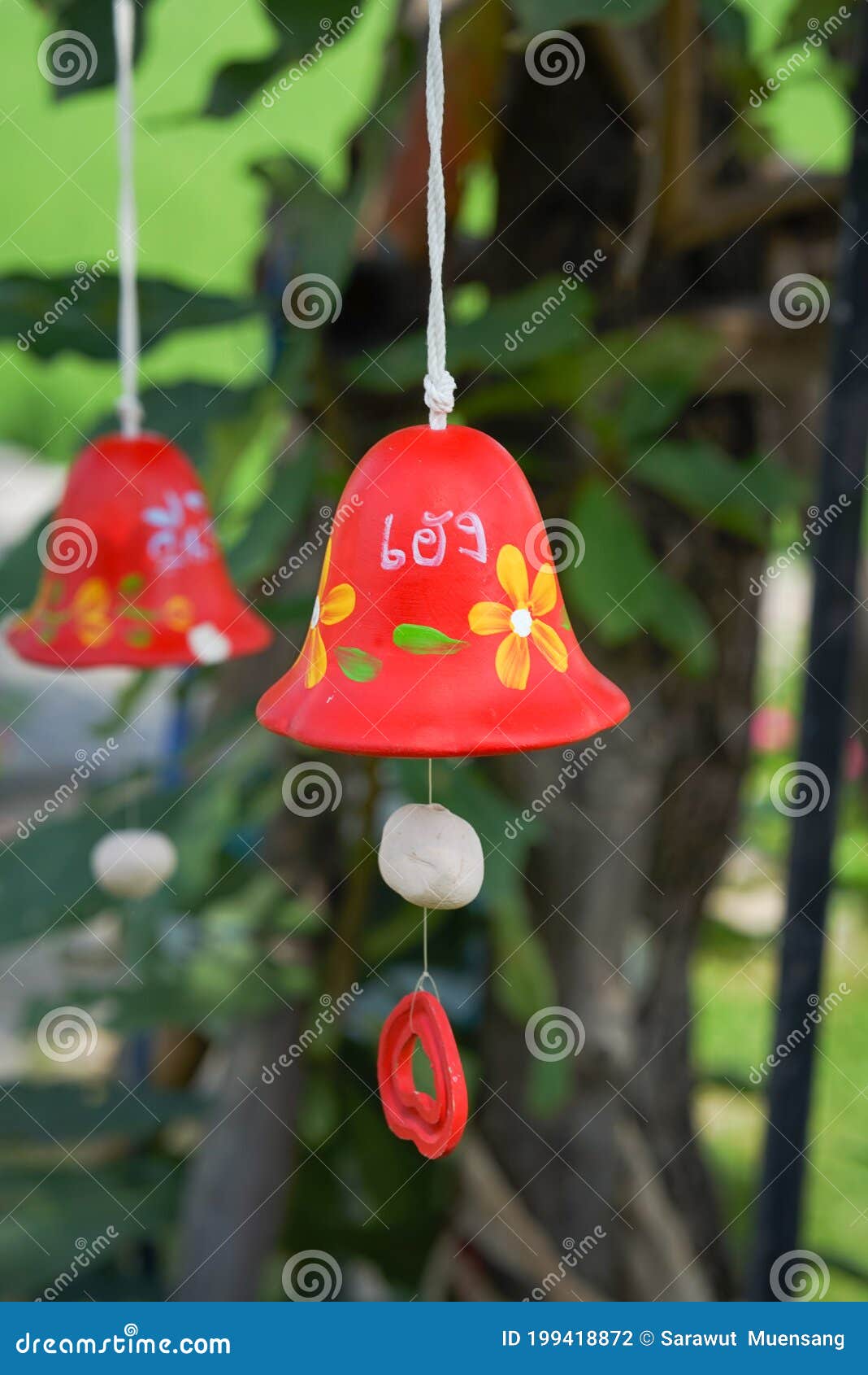 Red ceramic bells hanging stock photo. Image of autumn - 199418872