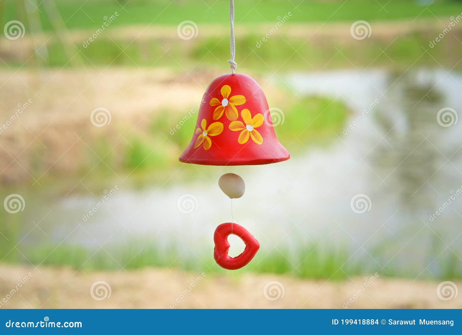 Red ceramic bells hanging stock photo. Image of clean - 199418884