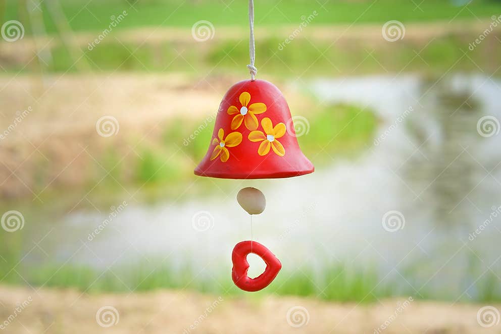 Red ceramic bells hanging stock photo. Image of clean - 199418884