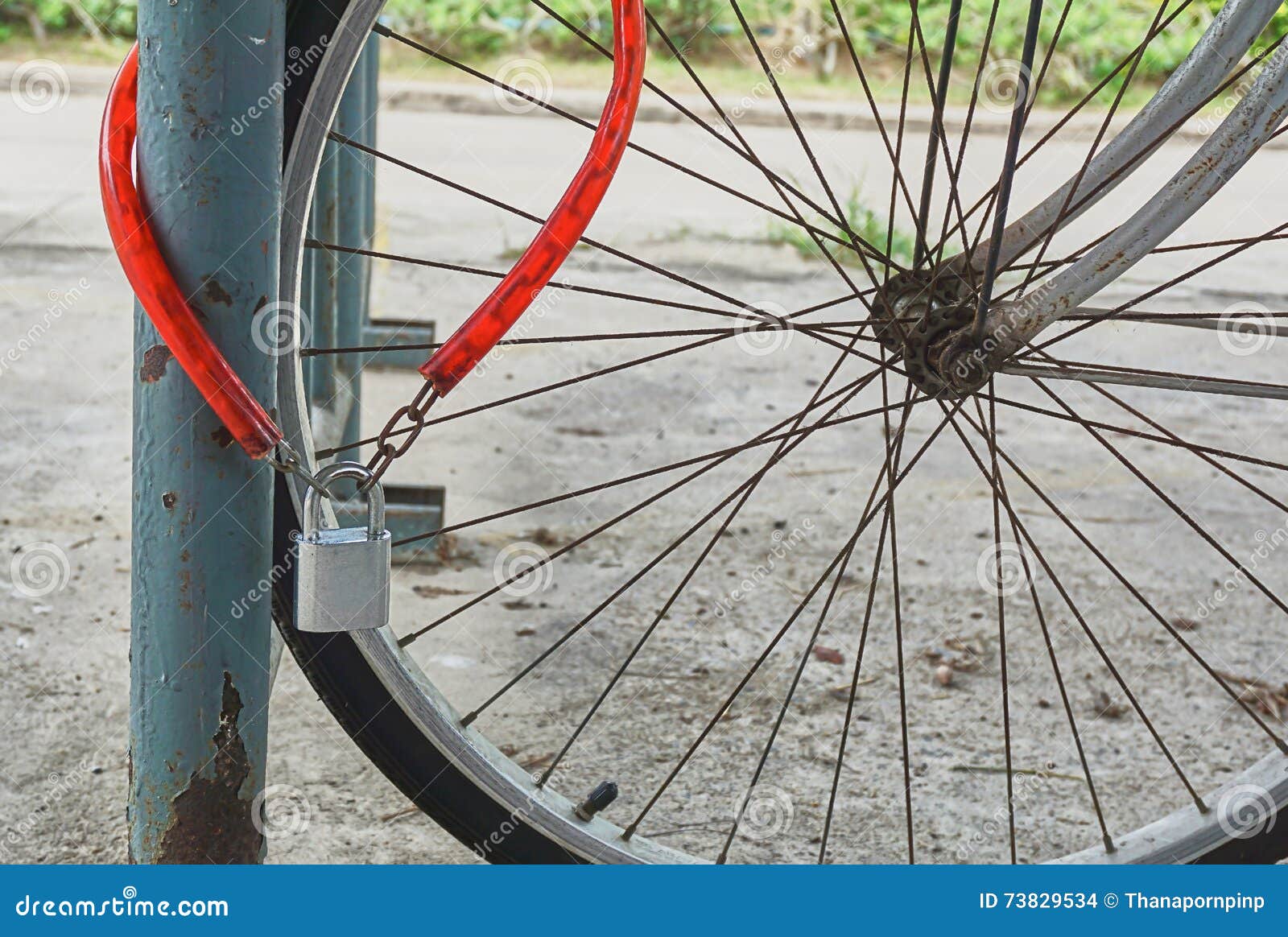 Red Chain and Silver Colored Lock on Bicycle Wheel. Stock Photo - Image ...