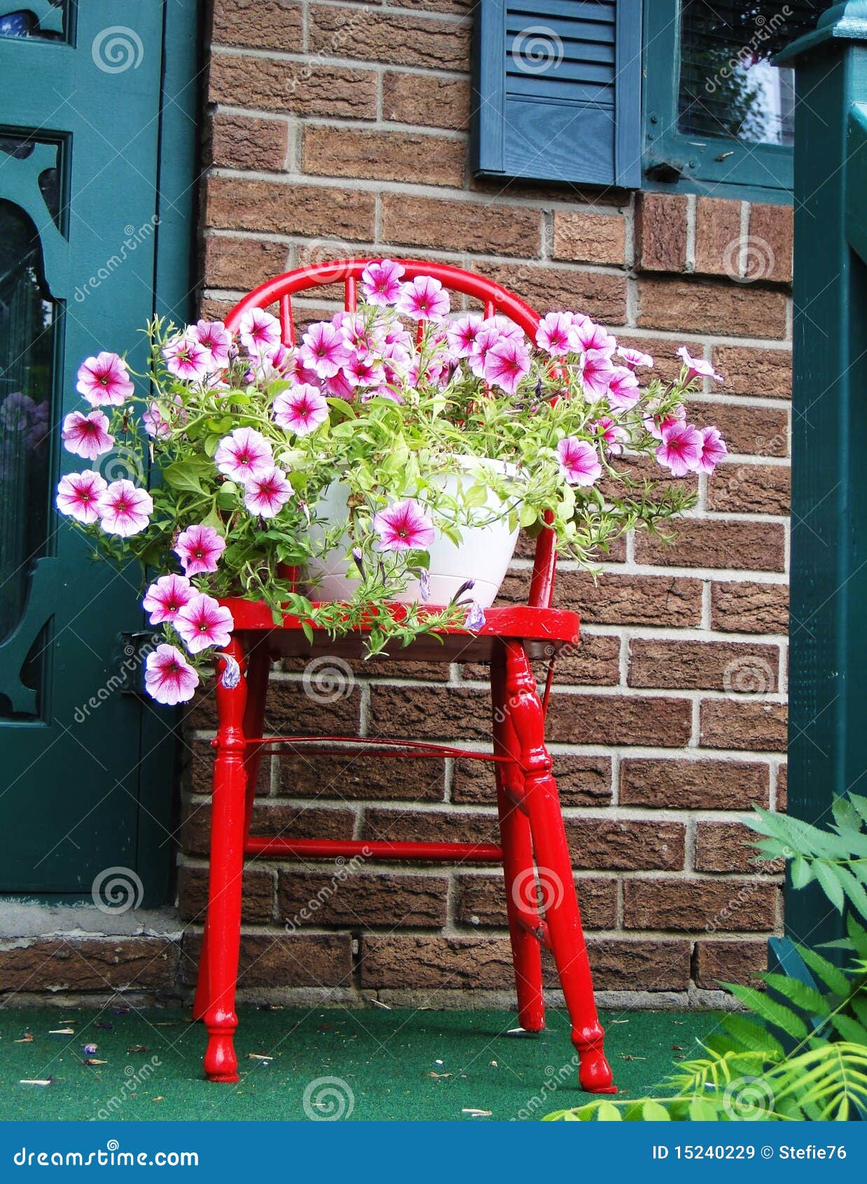Red chair and flowers stock image. Image of wood, home - 15240229