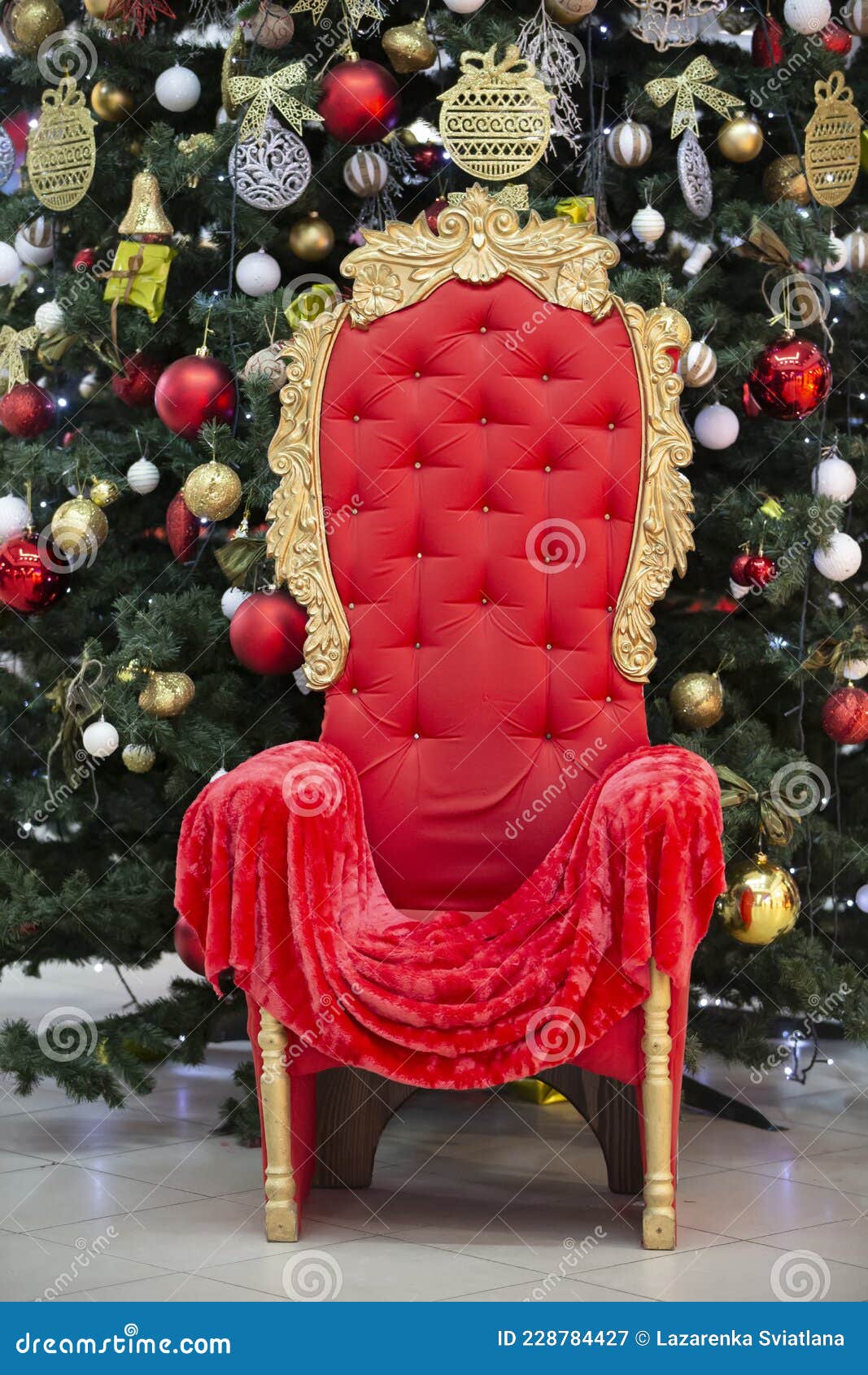 Red chair of santa claus stock image. Image of gold - 228784427