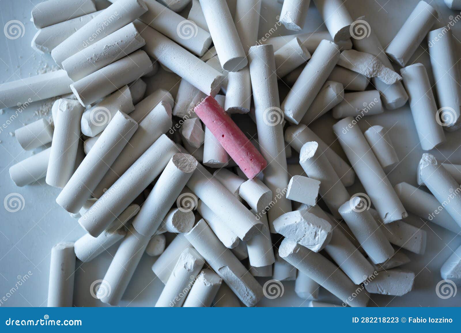 A Red Chalk in the Midst of Many White Chalks Expresses the Concept of ...