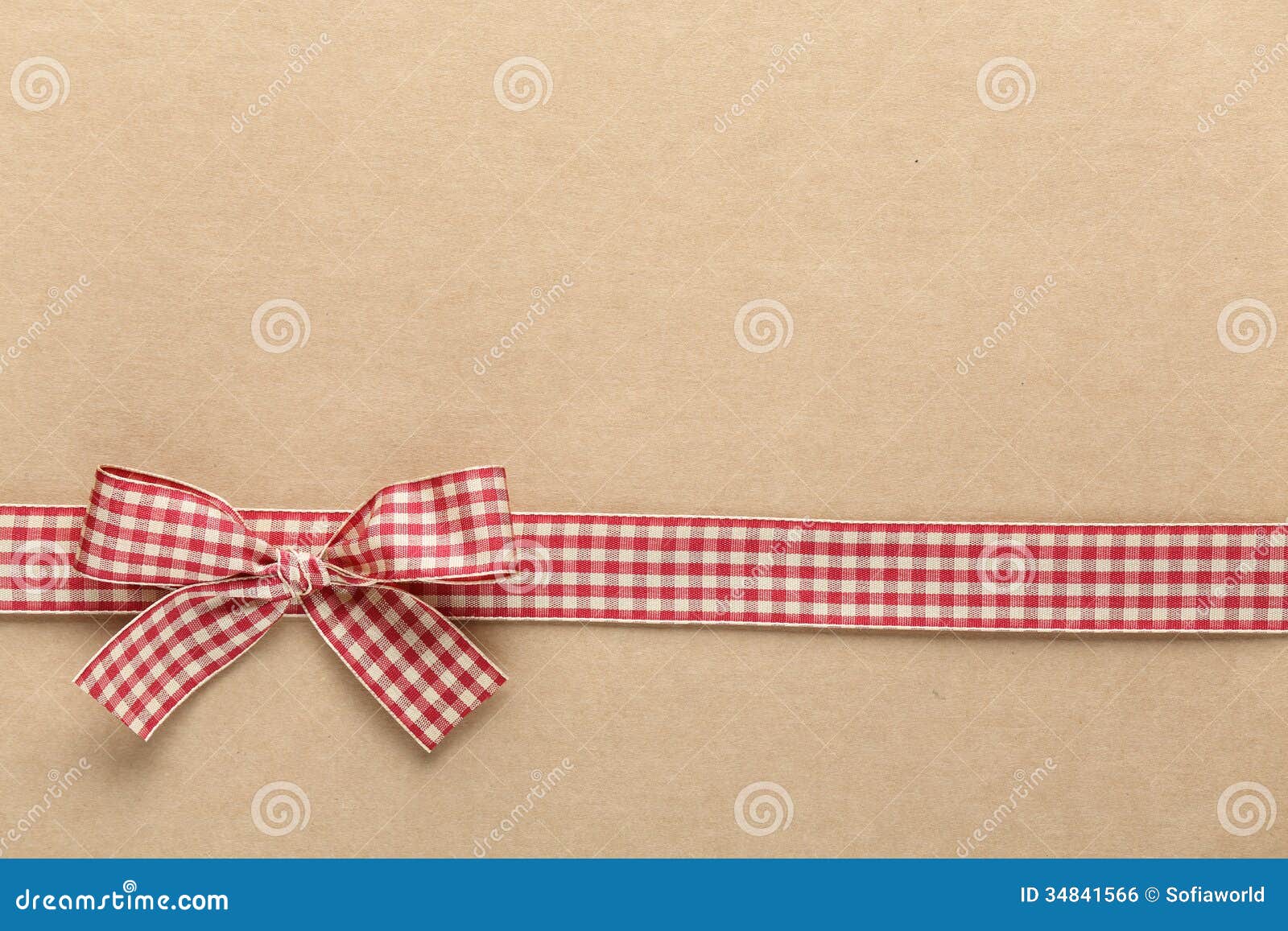 Red Checkered Ribbon Bow on Brown Paper Stock Photo - Image of ...