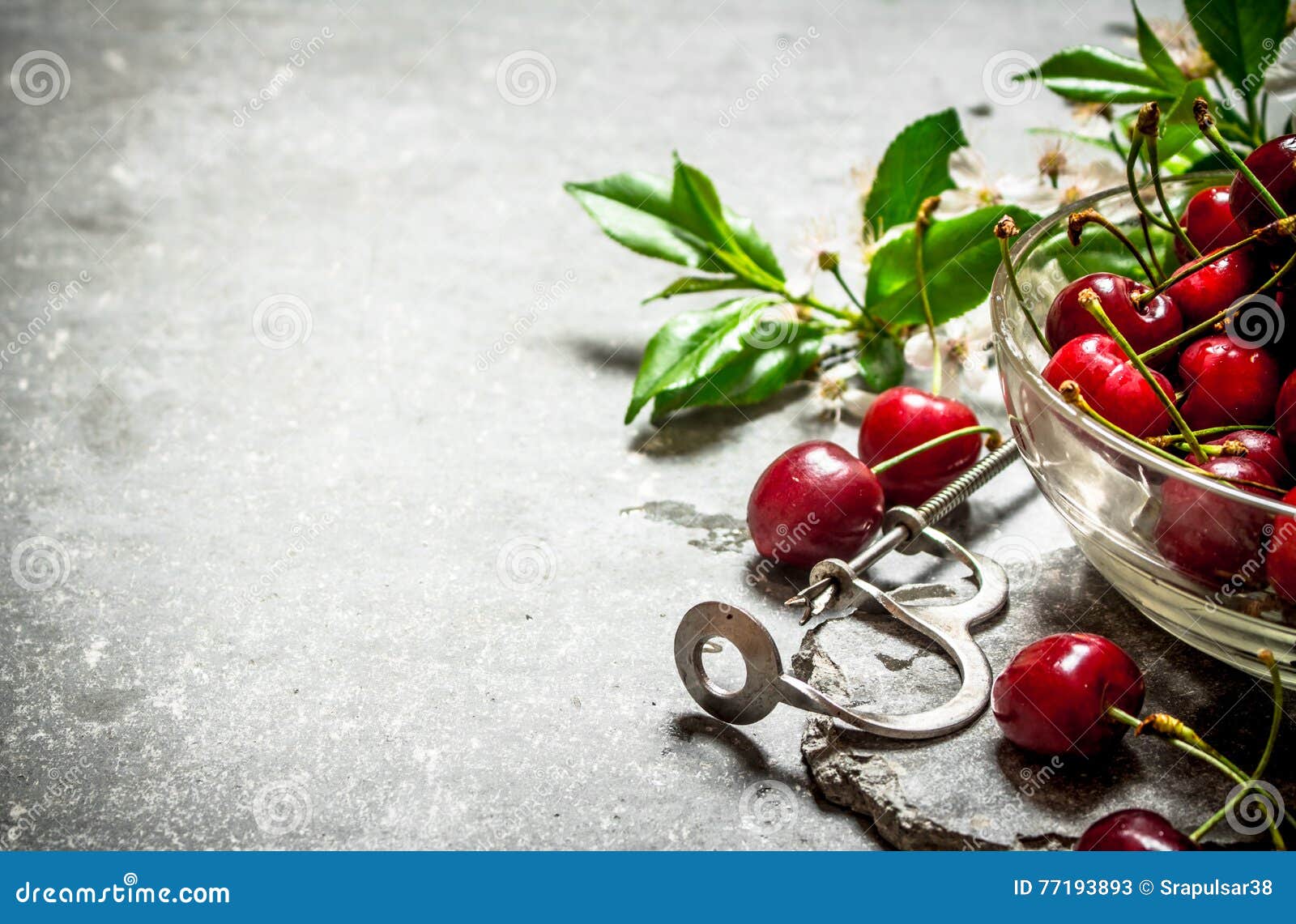 Red Cherry in the Cup and Metal Tool for Cherries. Stock Image - Image ...