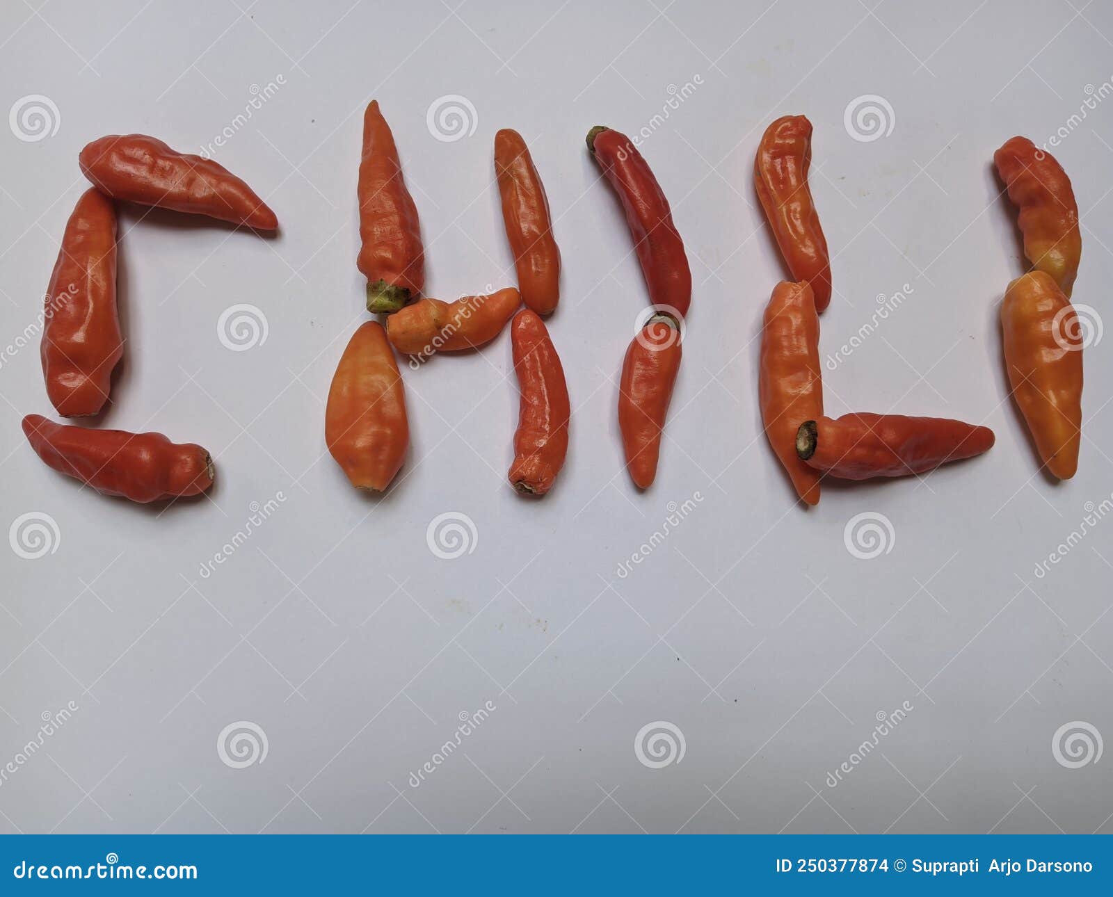 Red Chili in the Form of Writing on a Plain Background Stock Photo ...