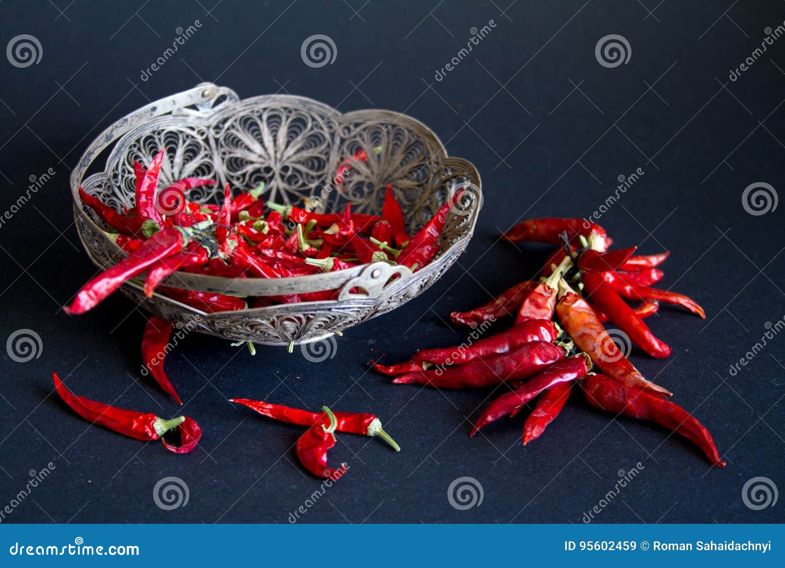 Red Chili Pepper in a Silver Vase on a Black Background Stock Image ...