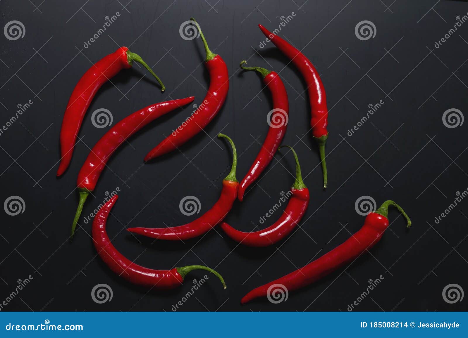 Red Chili Peppers on Black Backdrop Stock Photo - Image of backdrop ...