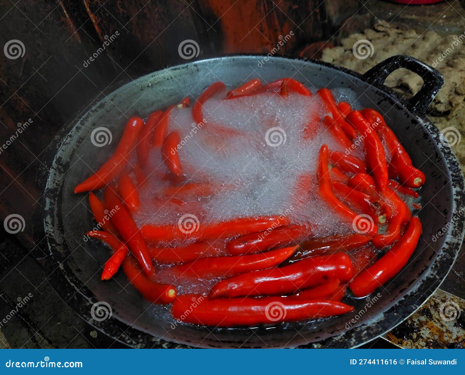 Red Chilies Being Boiled in Boiling Water Stock Photo - Image of boiled ...