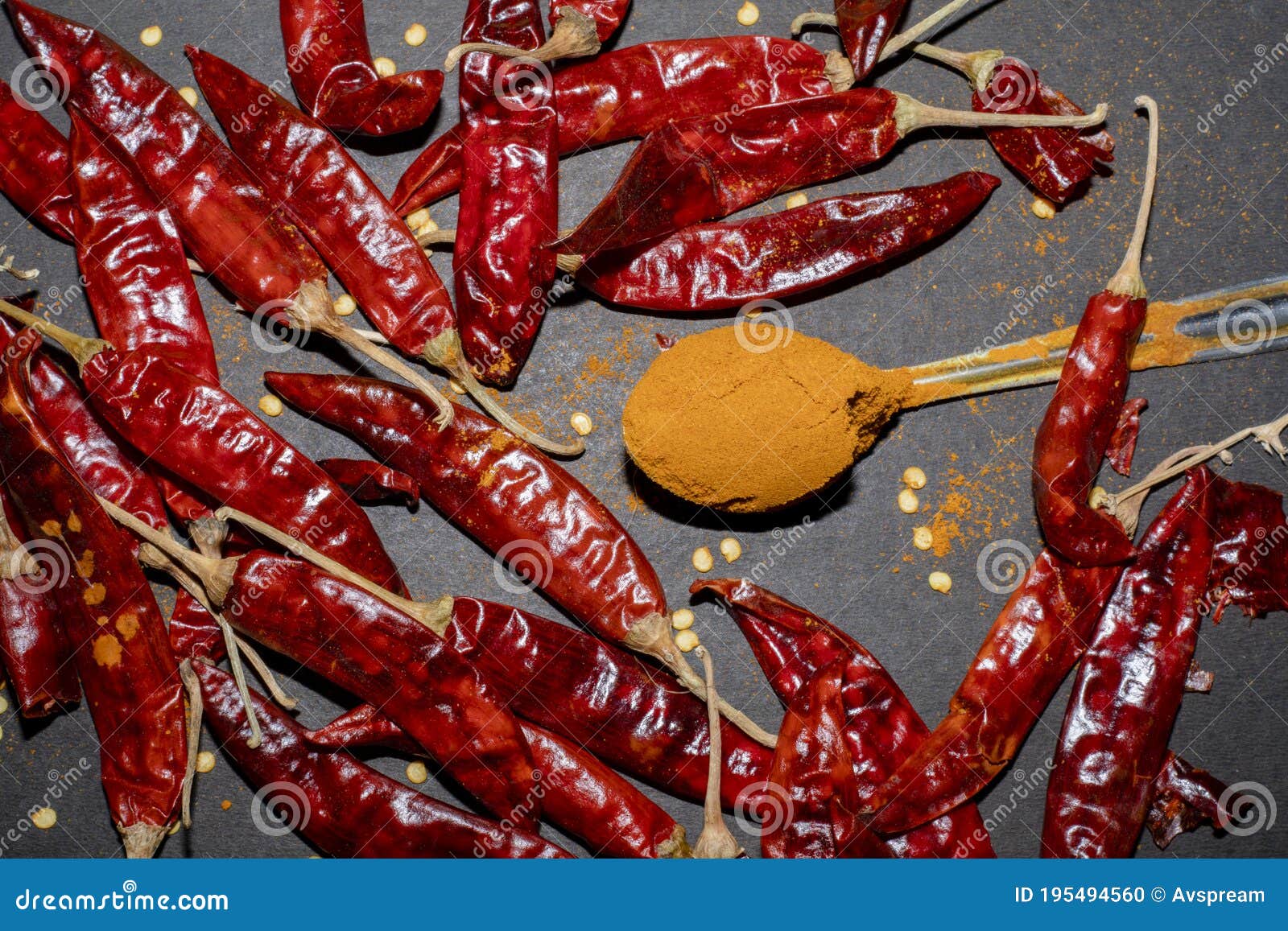 Red Chilli or Paprika Powder in Spoon on Table Stock Photo - Image of ...