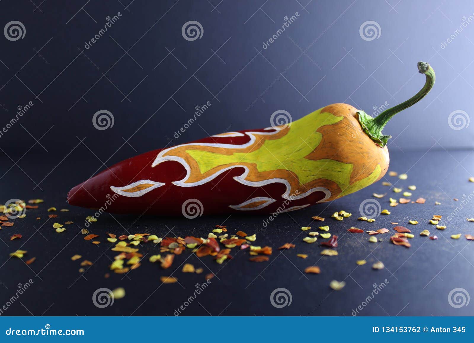Red Chilli Pepper with Painted Fire on Black Craft Paper Background ...