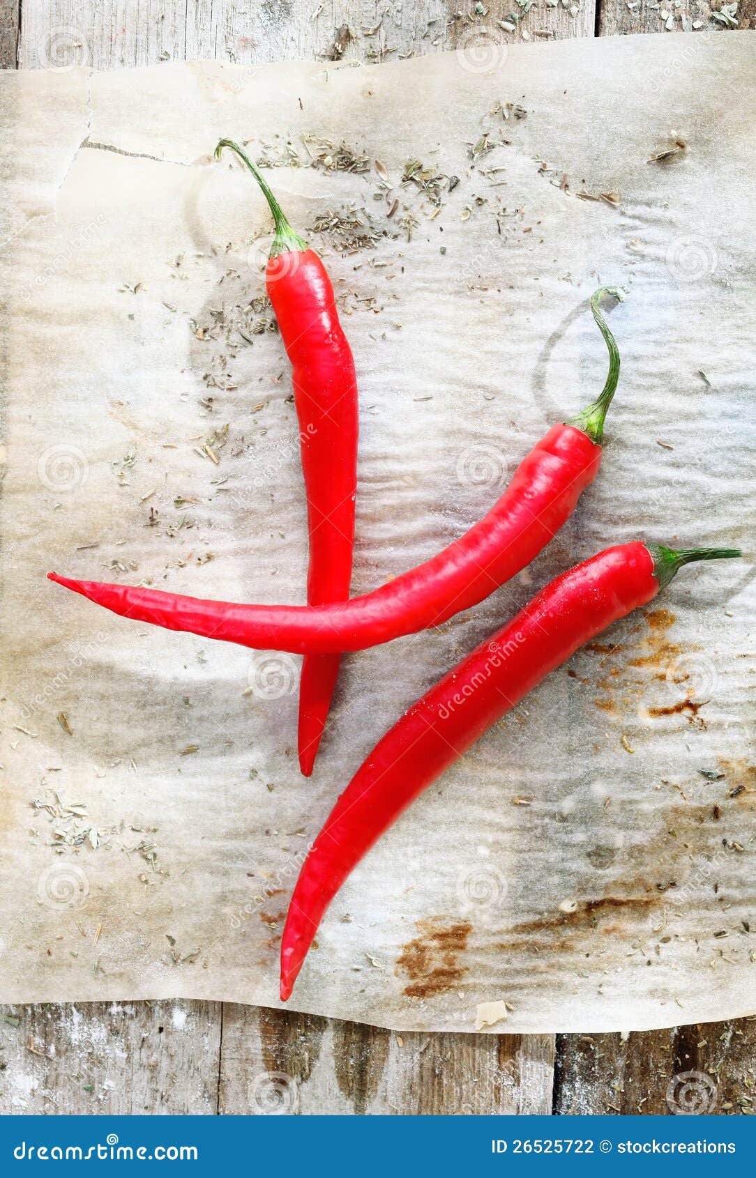 Red Chilli Peppers on Grunge Paper Stock Photo - Image of baked ...