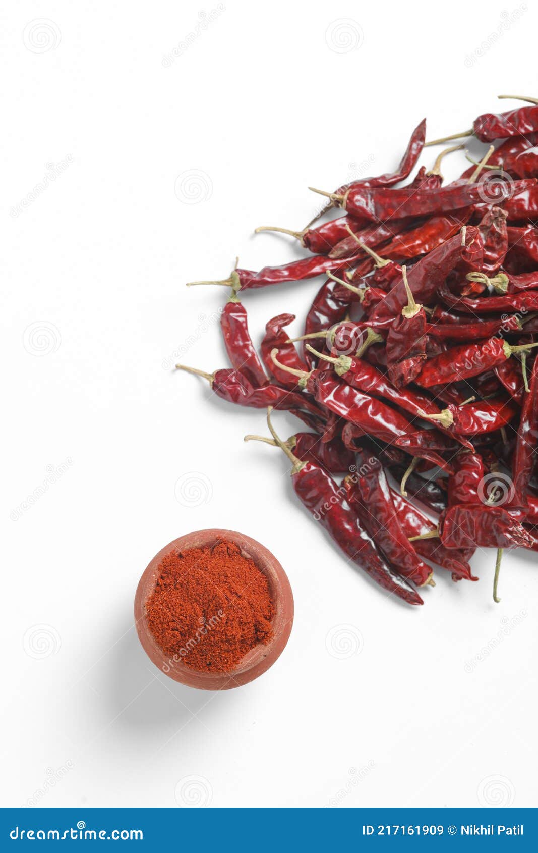 Red Chilli Powder with Dried Red Chillies. in Earthen Bowl Stock Image ...