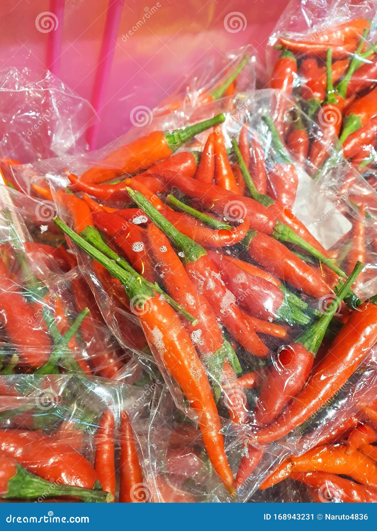 Red chilli sold in Market stock image. Image of long - 168943231